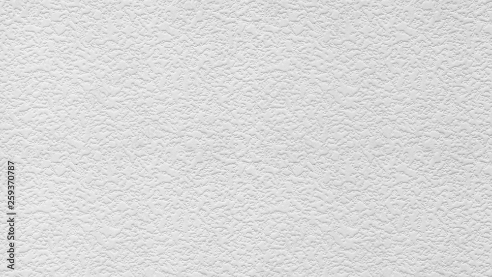 White concrete stucco wall with abstract snow shape paint surface ...