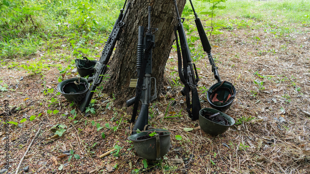 Weapon and tin hat after Maneuver. Stock Photo | Adobe Stock