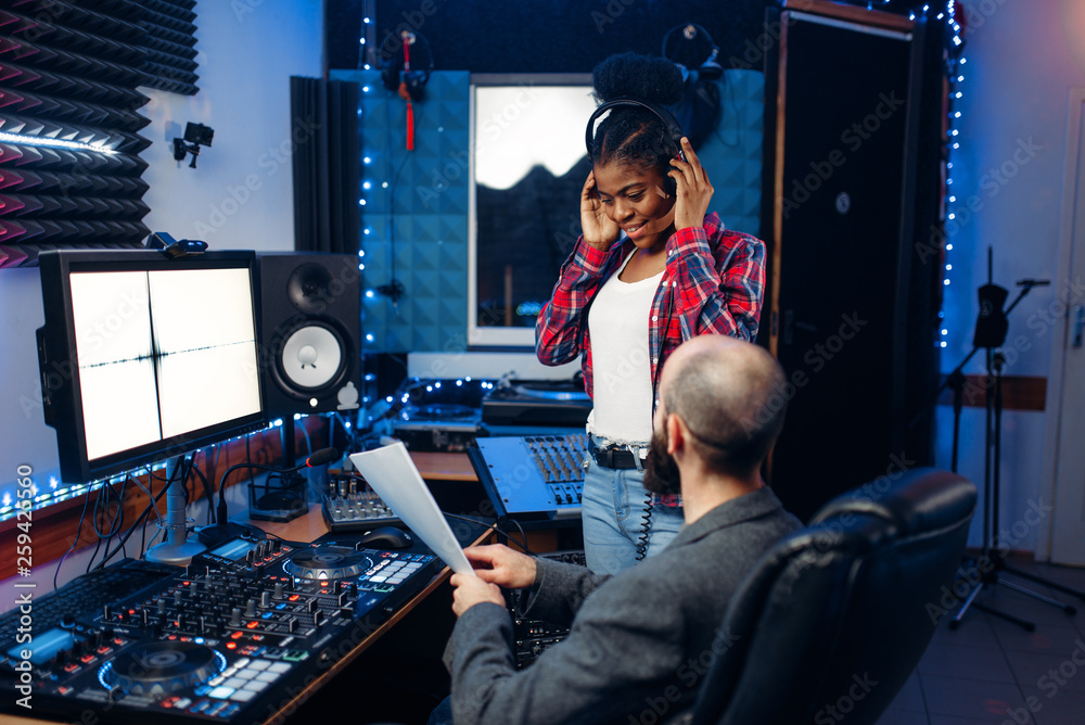 Sound operator and female singer, recording studio Stock Photo | Adobe ...