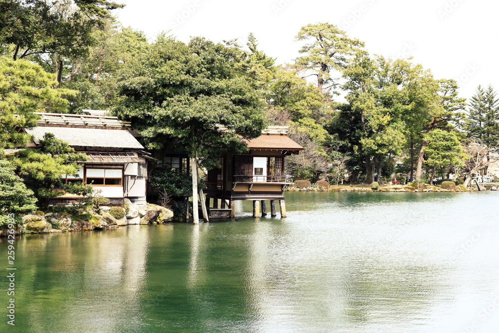 Tranquil scenery of a traditional Japanese Building at a lake in ...