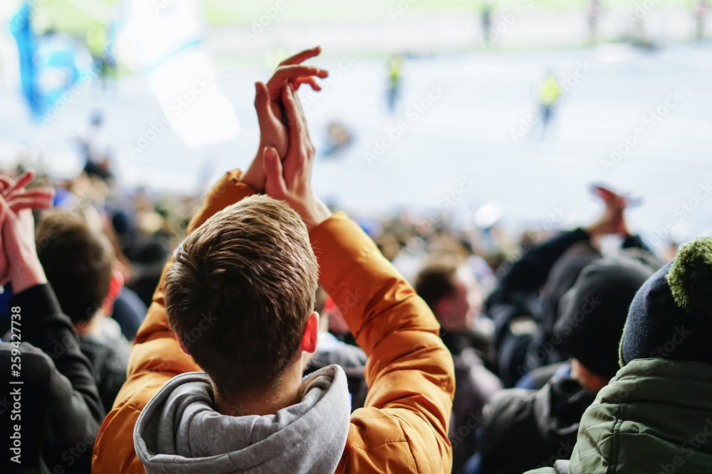 Football fans clapping on the podium of the stadium Stock Photo | Adobe ...