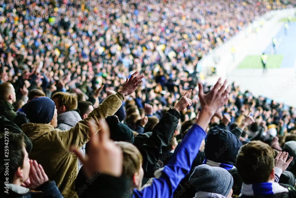 Football fans clapping on the podium of the stadium Stock Photo | Adobe ...