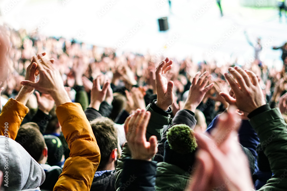 Vintage style photo of a crowd, happy people enjoying rock concert ...