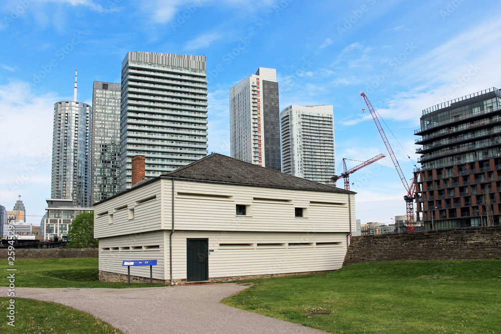 Historic Blockhouse and Modern Sklyline Stock Photo | Adobe Stock