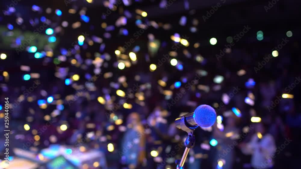 Microphone on stage, seminar audience from stage on background. concert ...