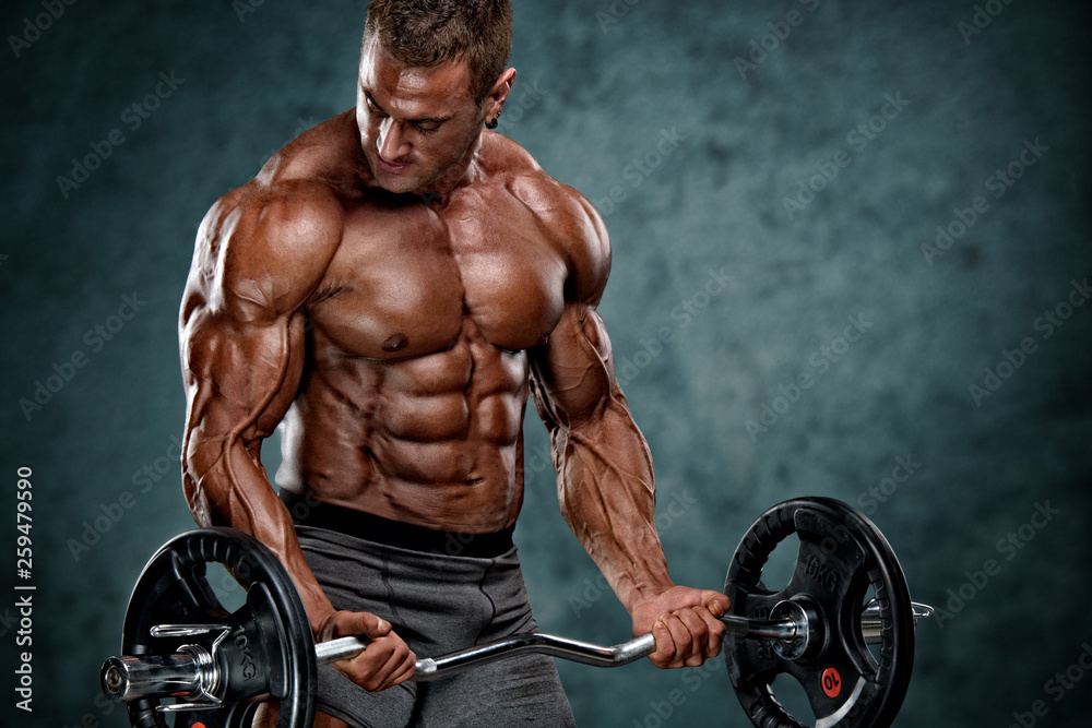 Bodybuilder Lifting Weights Stock Photo | Adobe Stock