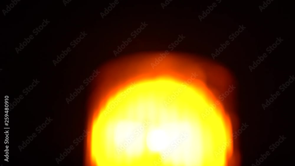 Close up yellow siren, alarm and emergency flashing. Light is spinning ...