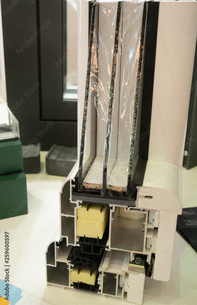 window profile cut. pvc, glass, plastic and aluminum frame shows modern ...