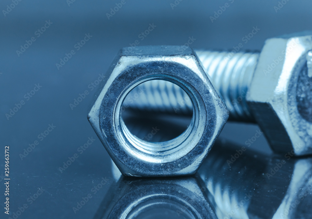 Closeup Bolts, steel screwbolts and nuts Used for capturing workpieces ...