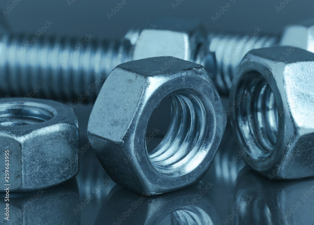 Closeup Bolts, steel screwbolts and nuts Used for capturing workpieces ...
