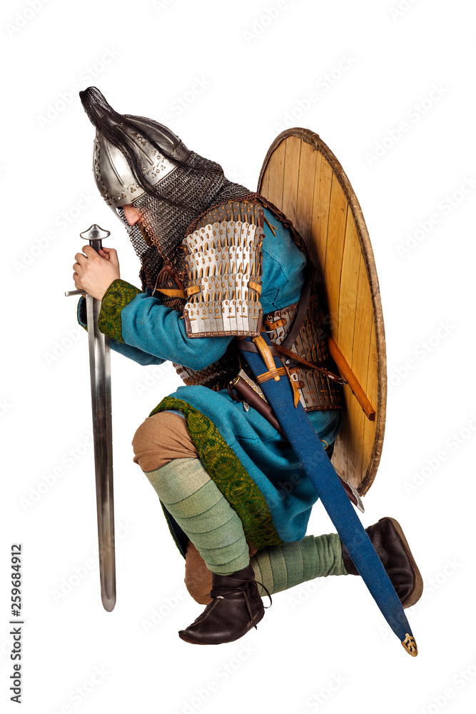 medieval soldier with helmet, hauberks, sword and shields isolated on ...