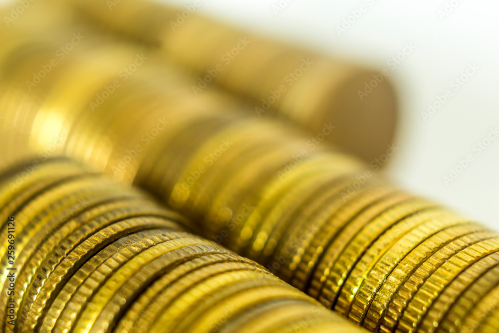 Macro photo of a long stack of coins. Stack lying on their sides. A ...