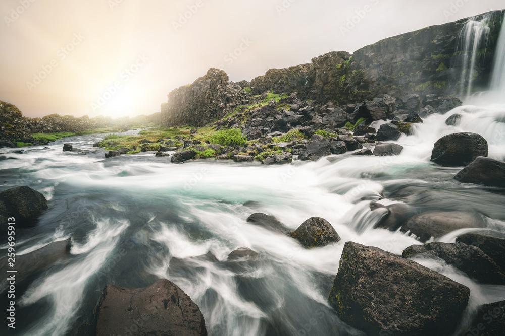 Landscape of Oxararfoss waterfall in Thingvellir National Park, Iceland ...