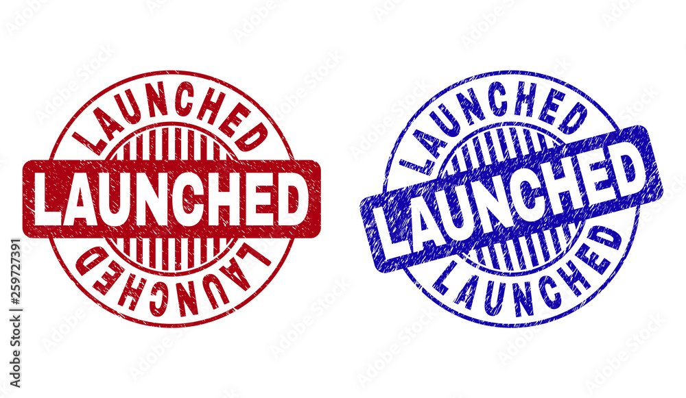 Grunge LAUNCHED round stamp seals isolated on a white background. Round ...