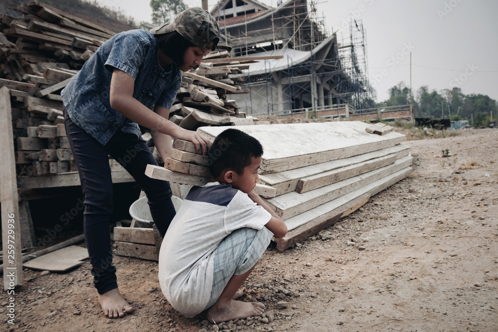 Child labor in building commercial building structures. World Labor Day ...