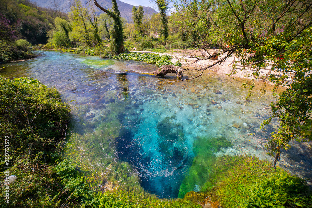 The Blue Eye spring (Syri i Kalter), a more than fifty metre deep ...