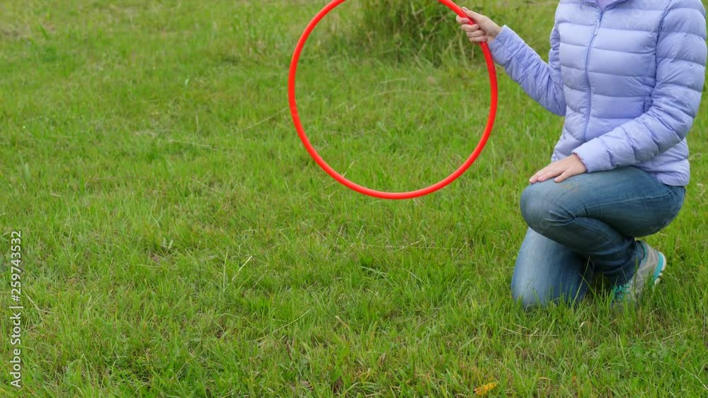 Dog start running and jump through red hoop, easy agility element ...