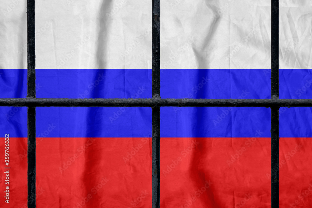 Russian flag behind black metal bars of a prison grate without shadows ...