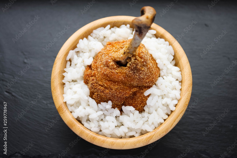 Breaded fried chicken leg with white rice Stock Photo | Adobe Stock