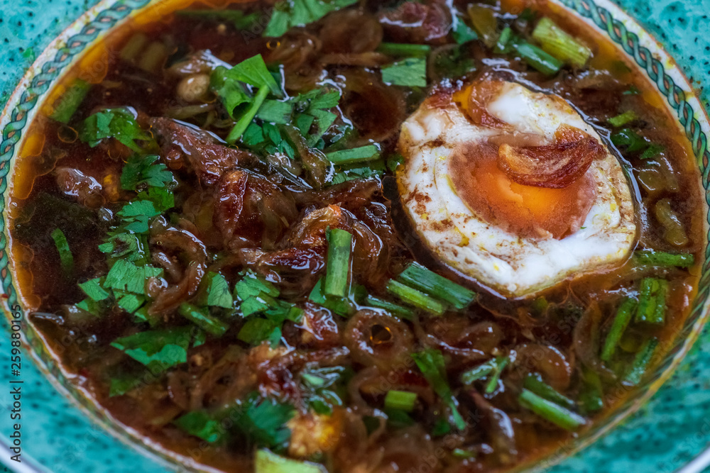rawon. Indonesian traditional food served with buffalo meat and salted ...