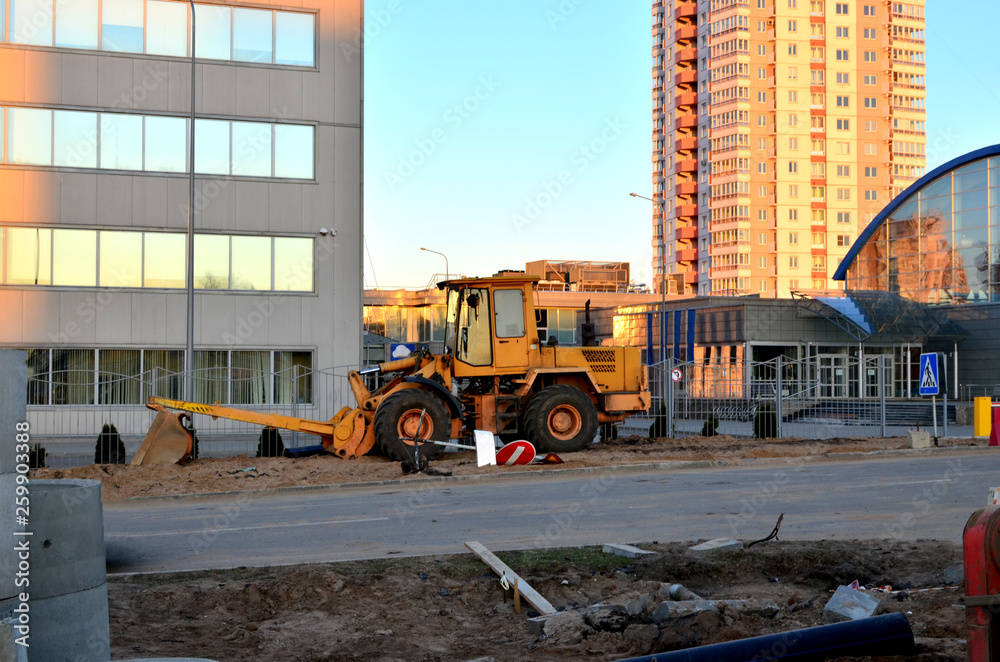 Front wheel loader working on the working platform on the street during ...