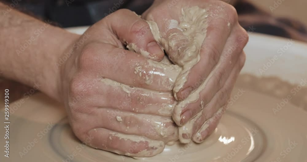 Video „Potter makes pottery from clay close up. Making ceramic products ...