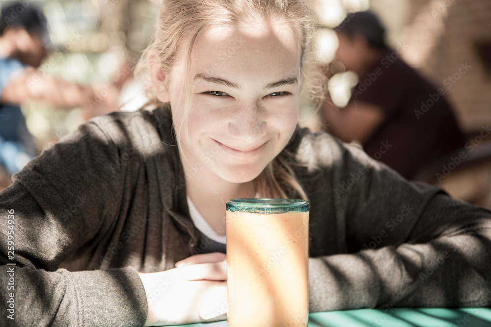 12 year old girl drinking fruit shake, Todos Santos, Mexico Stock Photo ...