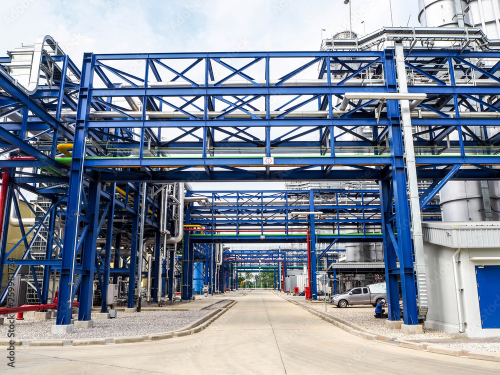 Steam pipe line and blue pipe rack in power plant. Stock Photo | Adobe ...