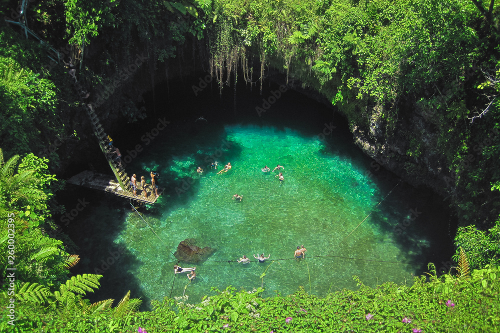 The famous To Sua Ocean Trench, swimming hole in Samoa, Upolu island in ...