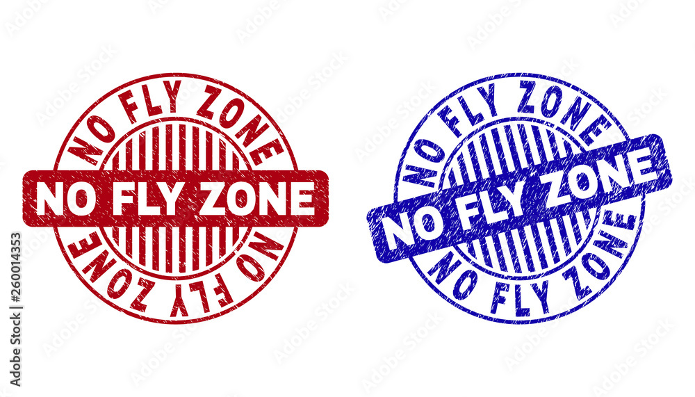 Grunge NO FLY ZONE round stamp seals isolated on a white background ...