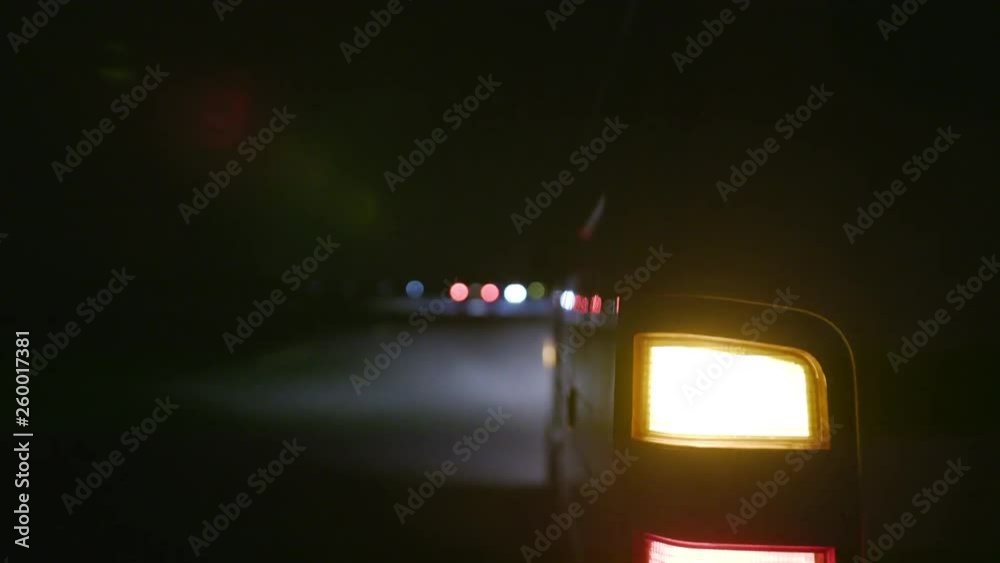 Black car stuck on the road with lights blinking. Night issue with car ...