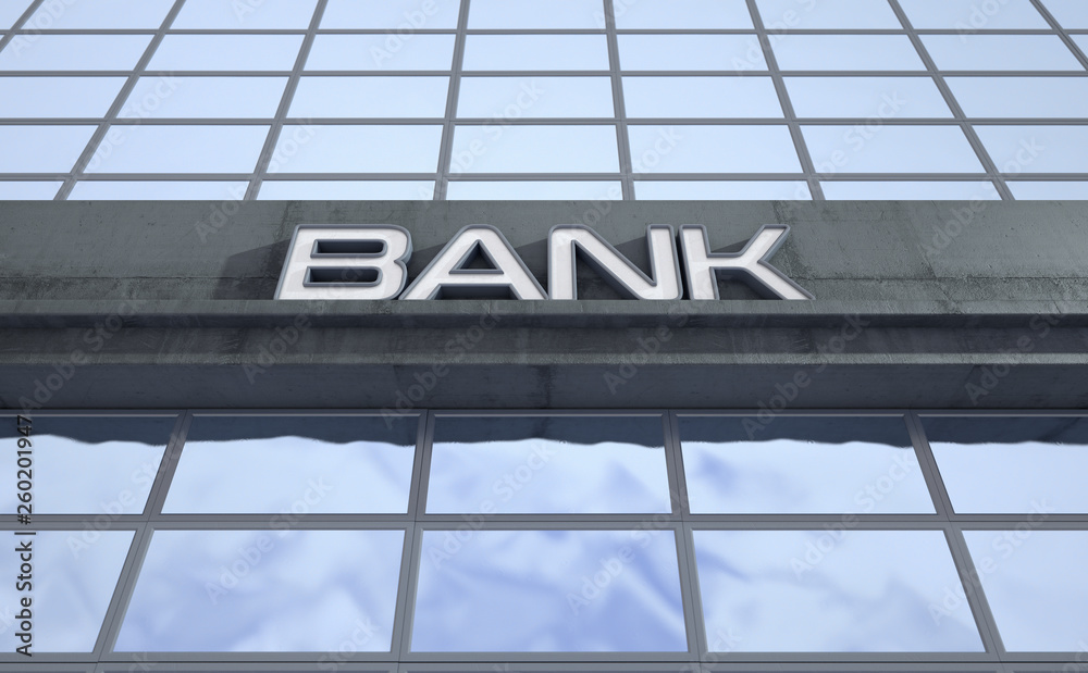 Signage above the entrance to a modern generic bank building made of ...