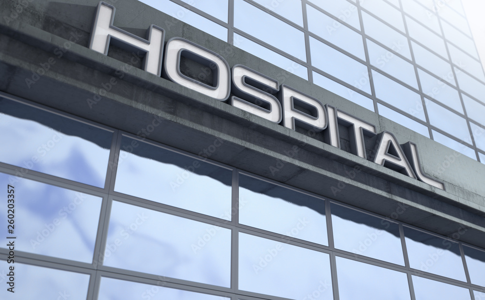 Signage above the entrance to a modern generic hospital building made ...