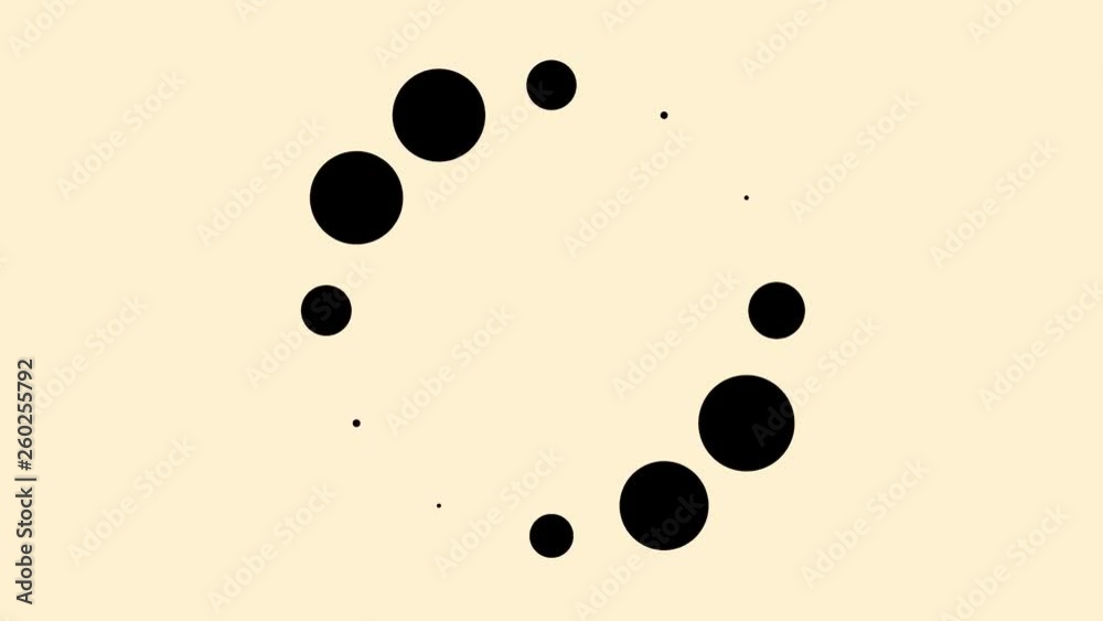 Abstract black spinning bubbles slowing down in a loading wheel on ...
