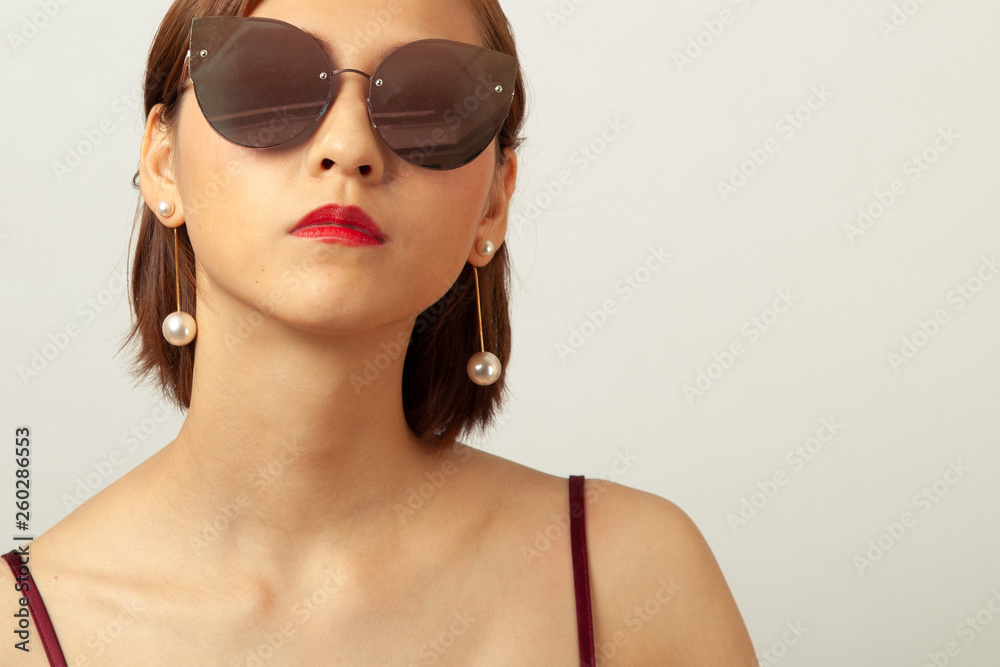 Chinese Girl wearing varies types of fashion sunglasses,looking sharp ...