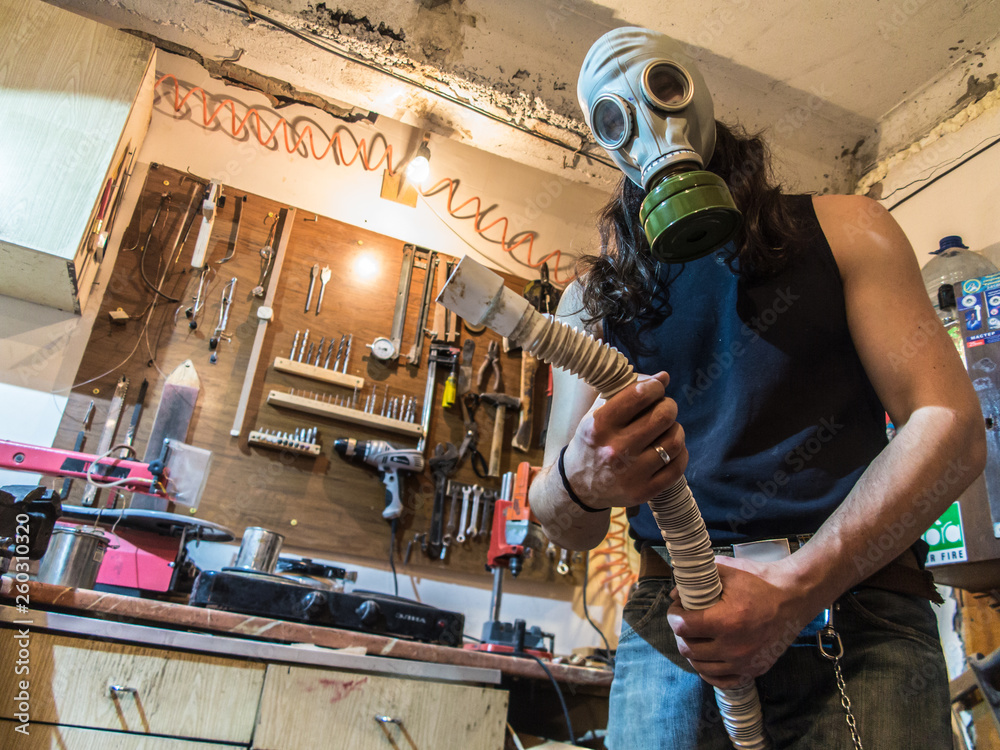 Сhernihiv, Ukraine - 07/26/2016: Worker in a workshop wearing soviet ...