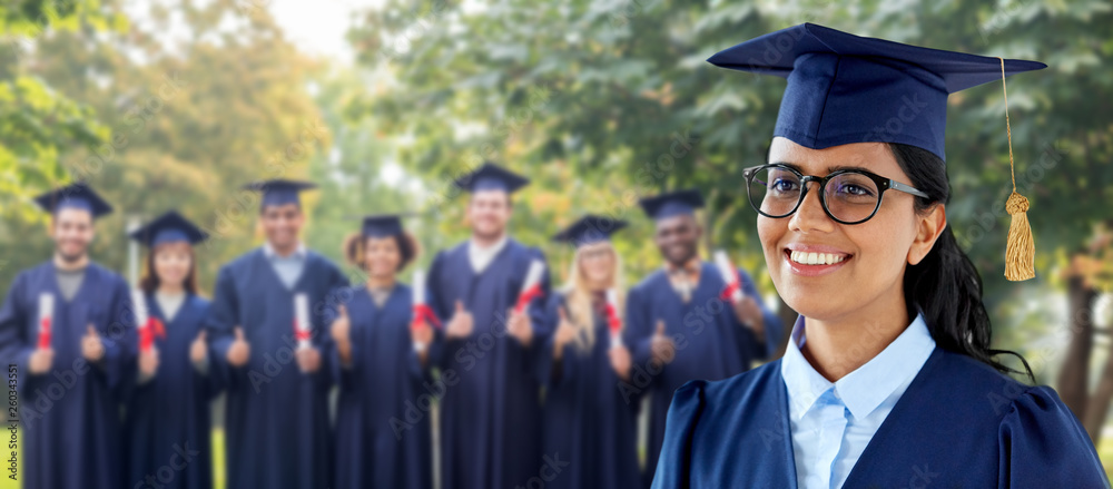 education, graduation and people concept - happy female graduate ...