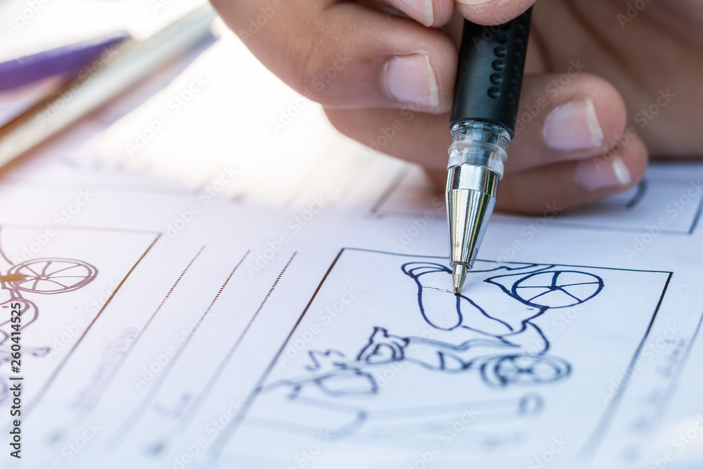 Hands drawing storyboard animation comic for pre-production process ...
