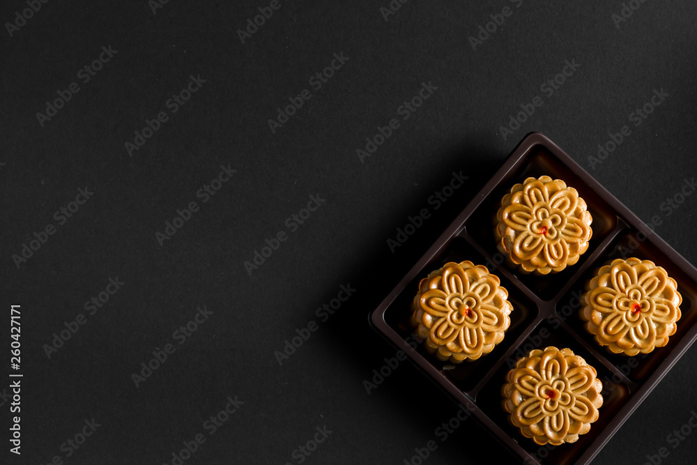Moon cake on black background Stock Photo | Adobe Stock
