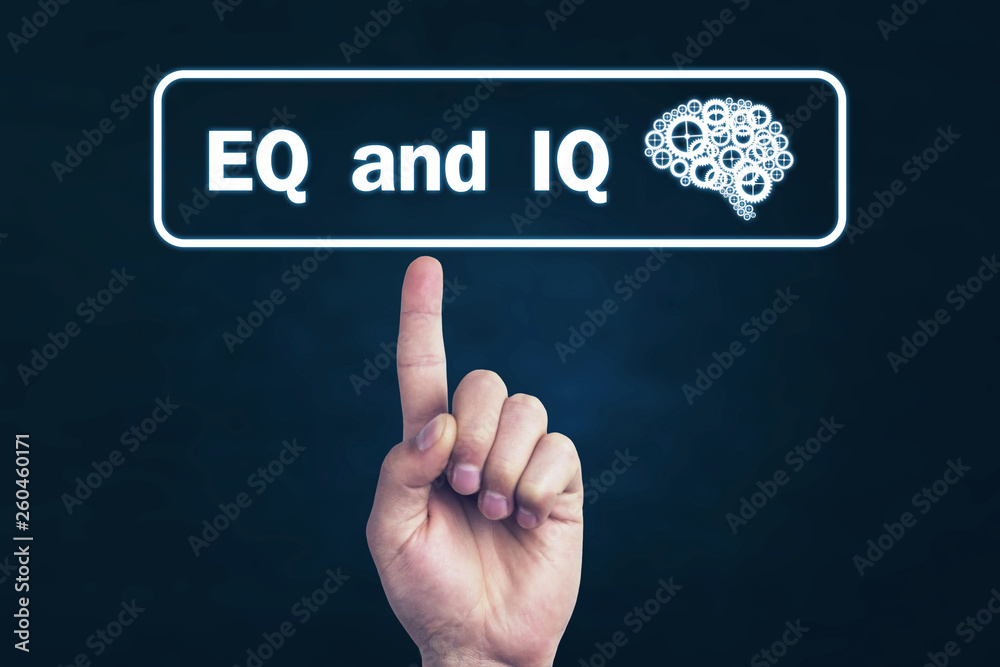 Male hand pointing Eq and Iq word. Stock Photo | Adobe Stock
