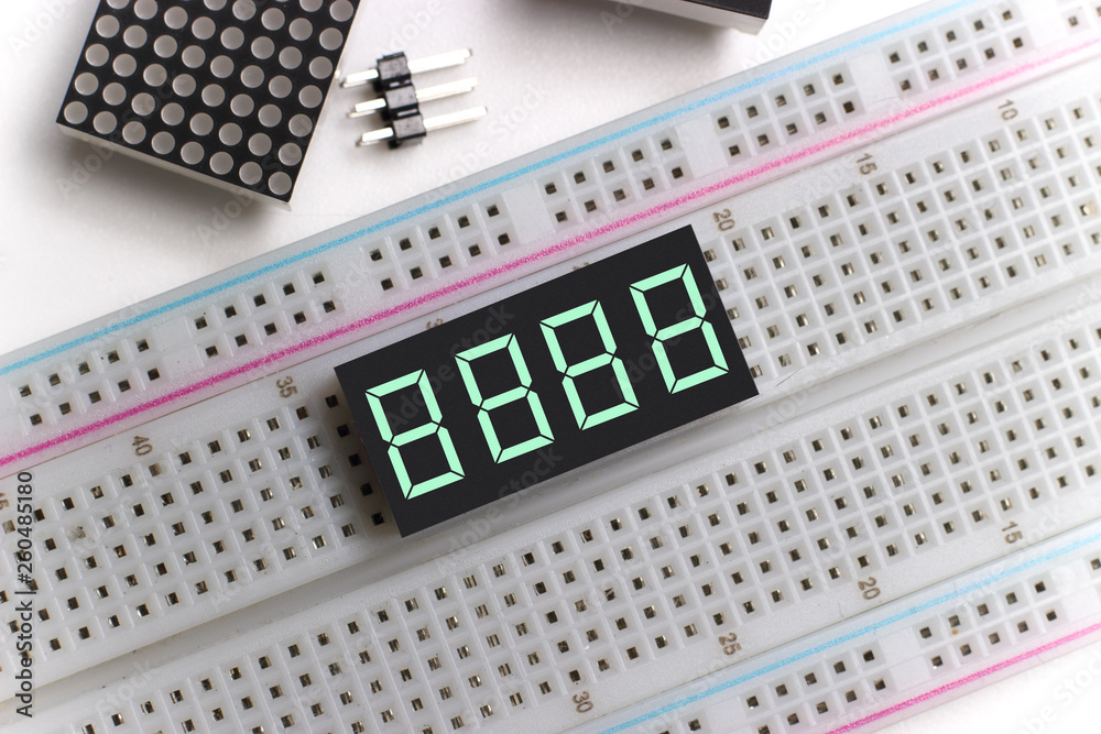 Breadboard close-up and seven segment indicators. Stock Photo | Adobe Stock