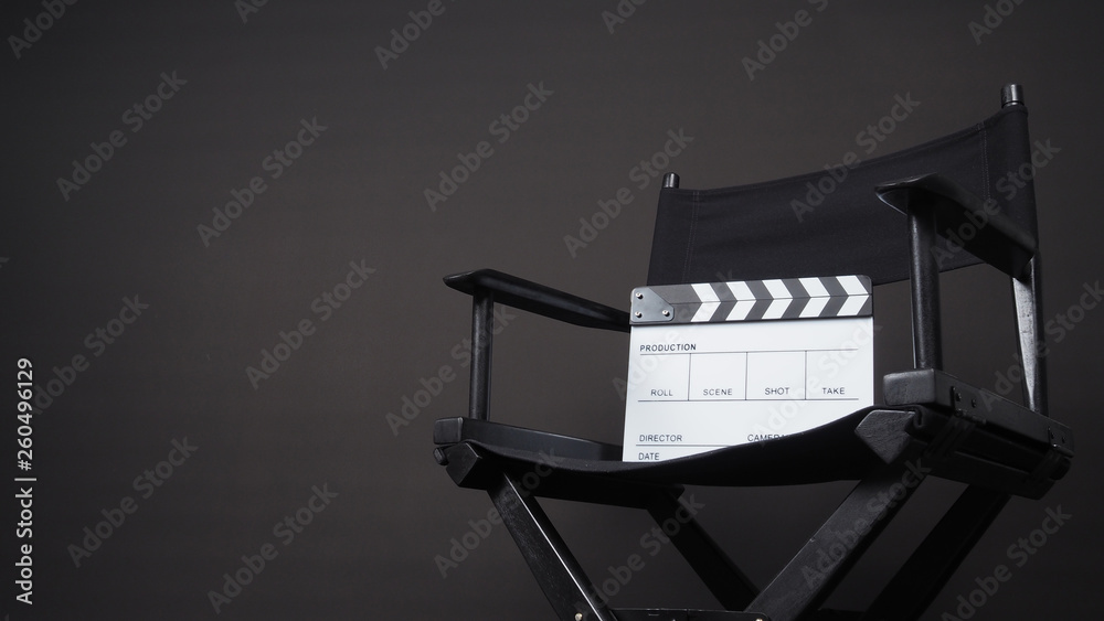 Clapperboard or clap board or movie slate with black director chair use ...