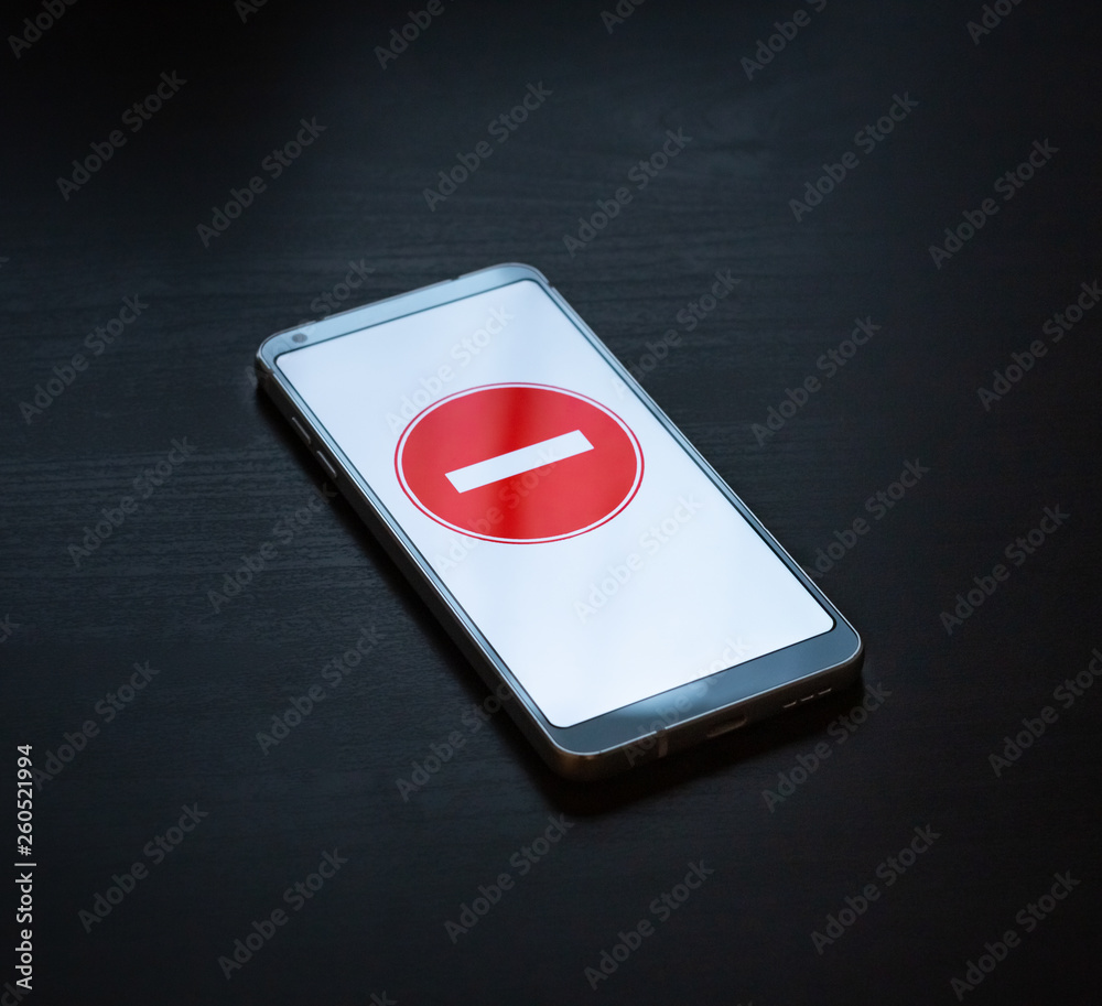 mobile phone with red no entry sign Stock Photo | Adobe Stock