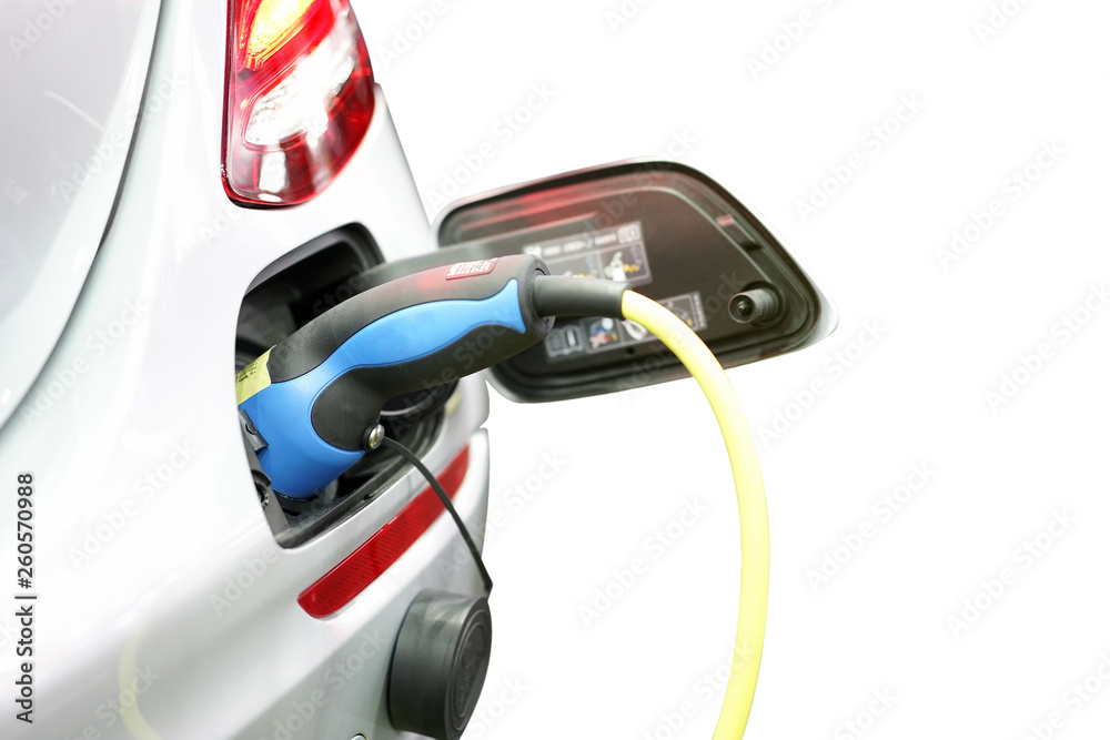plug of power cable electric supply during charging at ev car (electric ...