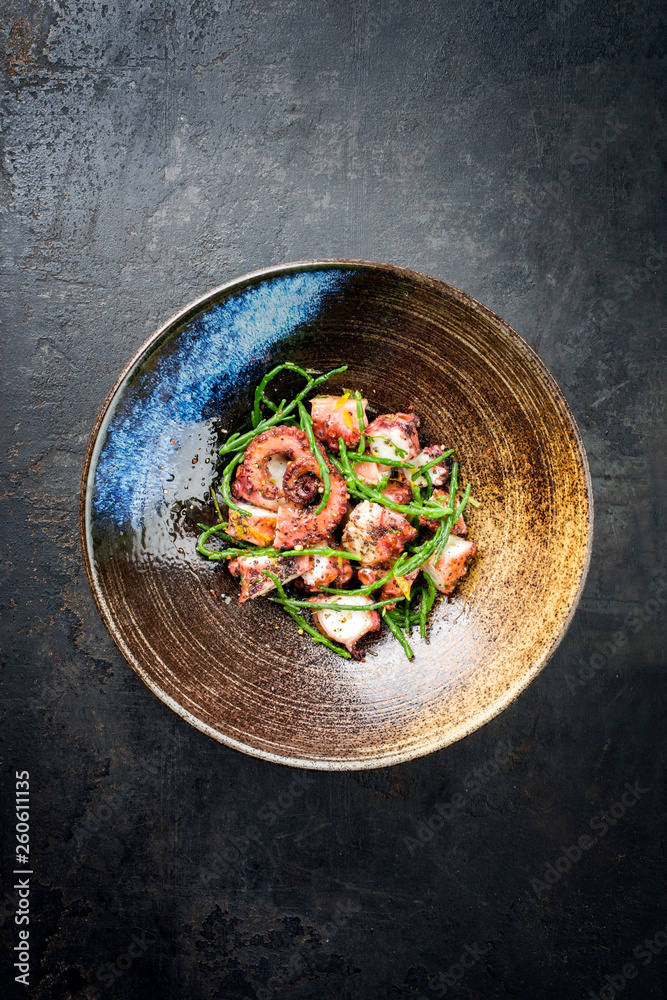 Traditional French octopus braised cooked with Salicornia, lemon curd ...