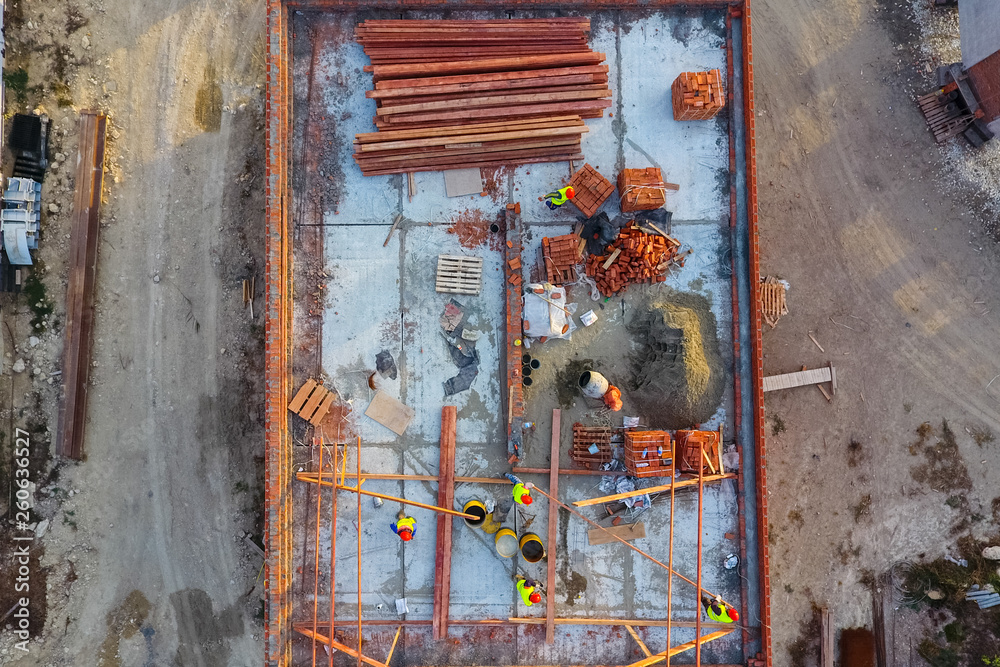 Construction of a brick building. Installation of the roof ...