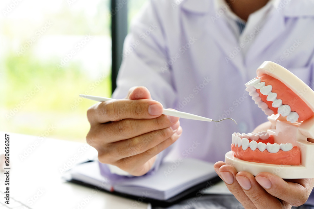 dentist work on the table with Denture and teeth x-ray Stock Photo ...