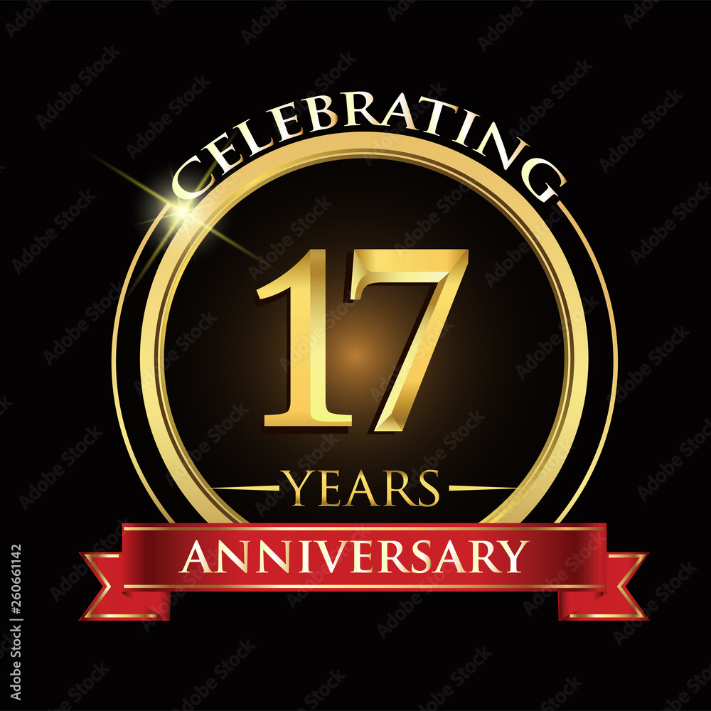 Celebrating 17 years anniversary logo. with golden ring and red ribbon ...