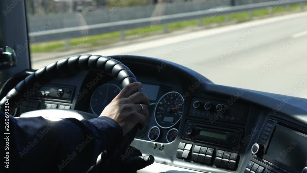 Video „Bus driver behind the wheel of long-distance coach. Man driving ...