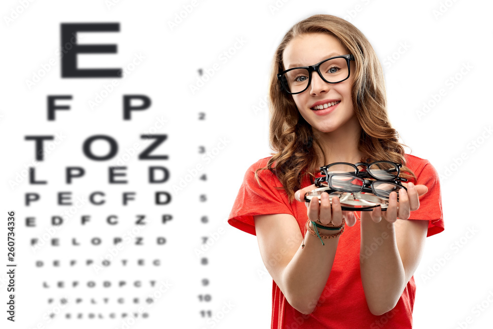 vision, eyesight and eyewear concept - smiling teenage student girl ...
